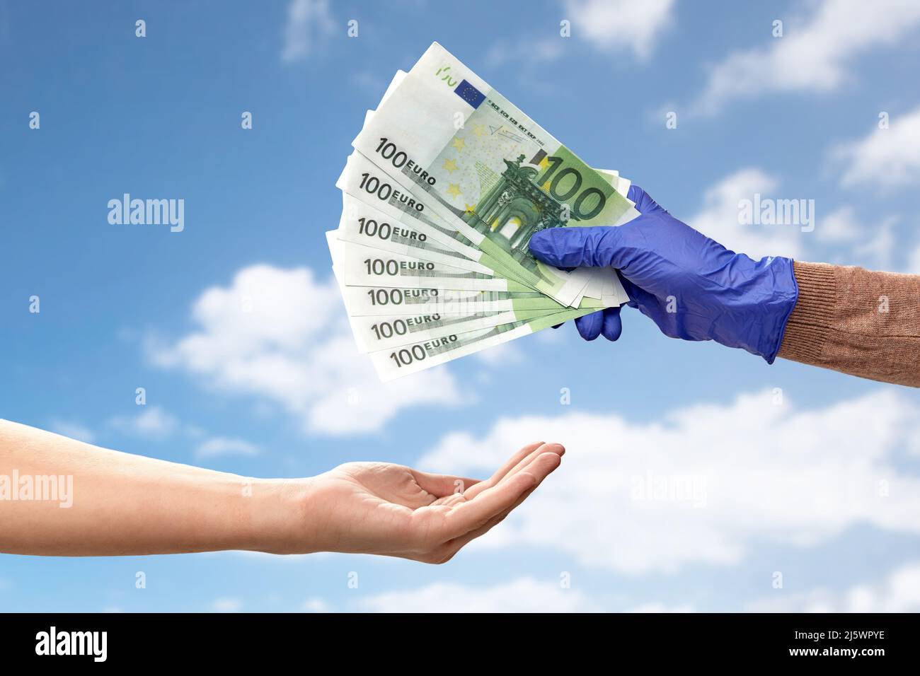 Woman giving money to charity hi-res stock photography and images - Alamy
