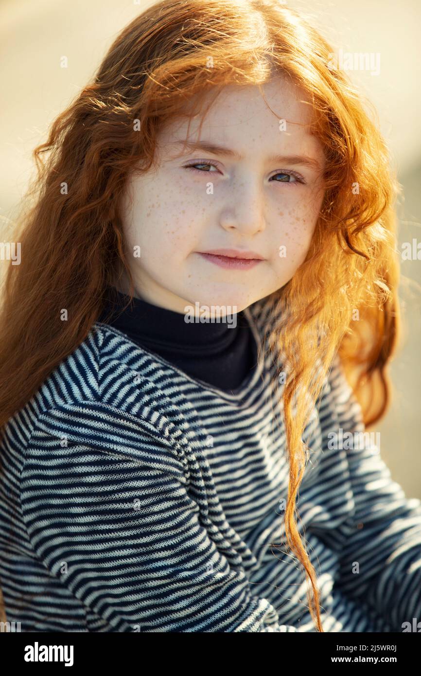 Beautiful redhead girl outdoors Stock Photo - Alamy