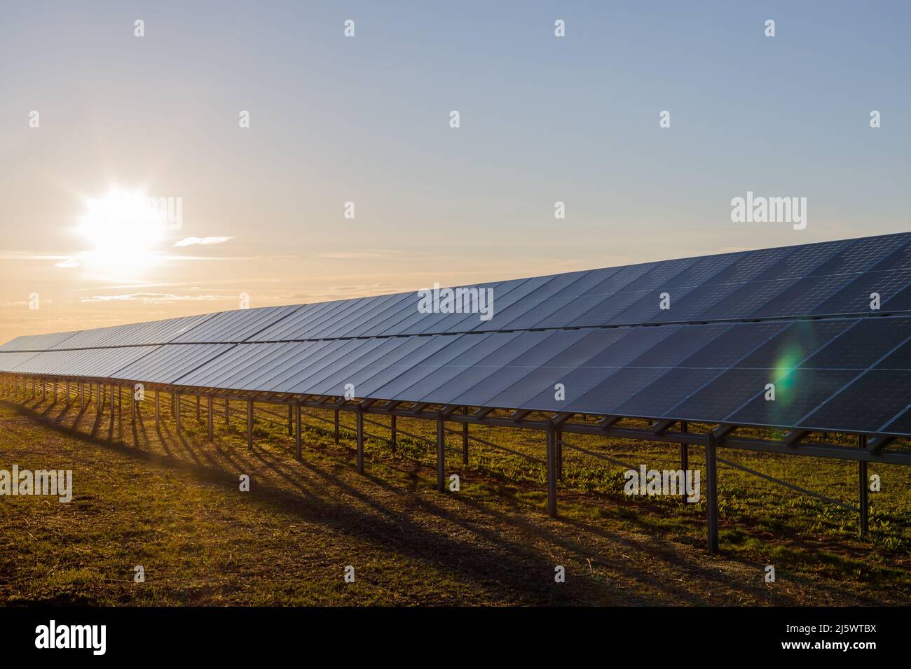 Solar panel with sunlight, sunset. Concept of clean energy, alternative ...