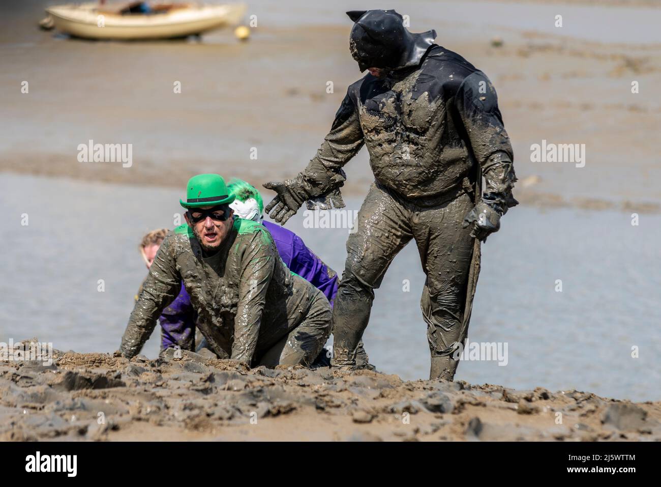 'Batman' offering a helping hand to the Riddler at the Maldon Mud Race ...