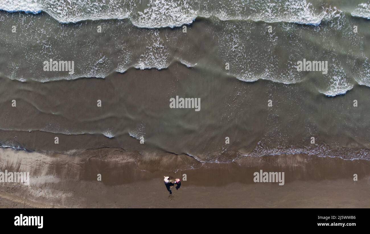 Top view of texture waves sandy beach Stock Photo - Alamy