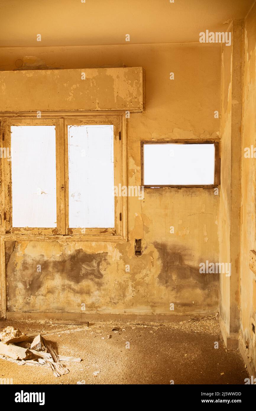 Abandoned room with broken window Stock Photo - Alamy