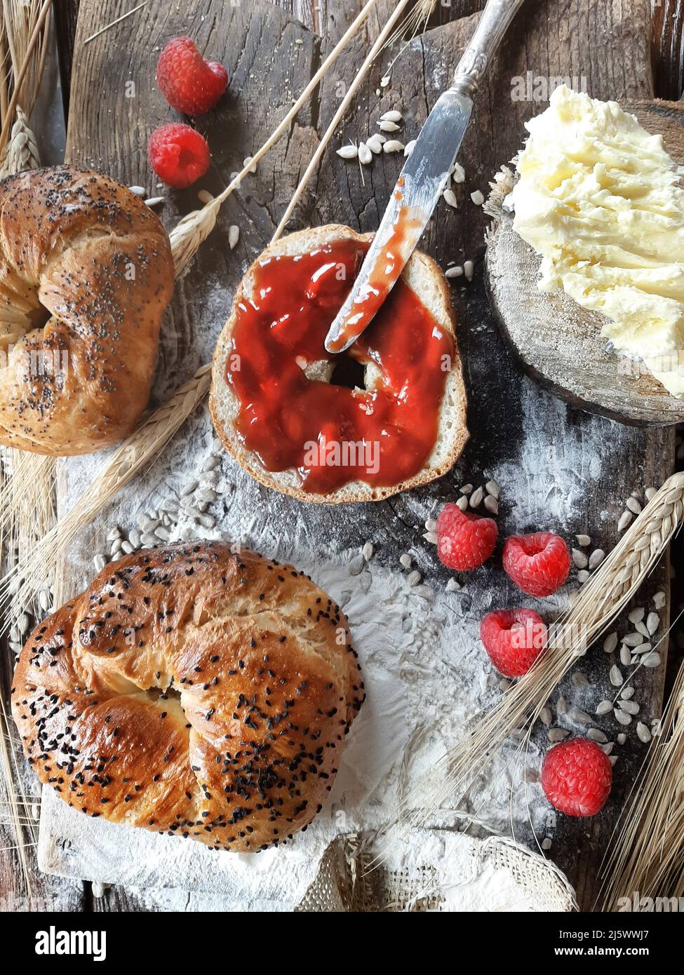 delicious rolls with poppy seeds and raspberry jam Stock Photo - Alamy