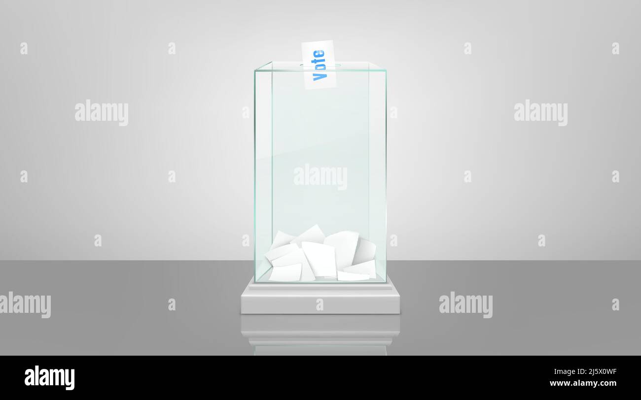 Glass ballot box filled with documents and voting envelope in slot ...