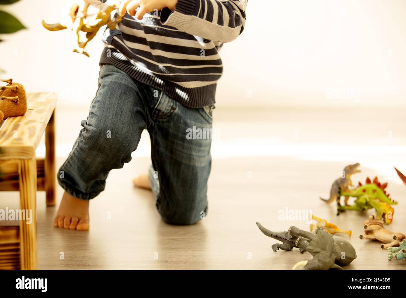 Little toddler child, boy, pee in his pants while playing with toys ...