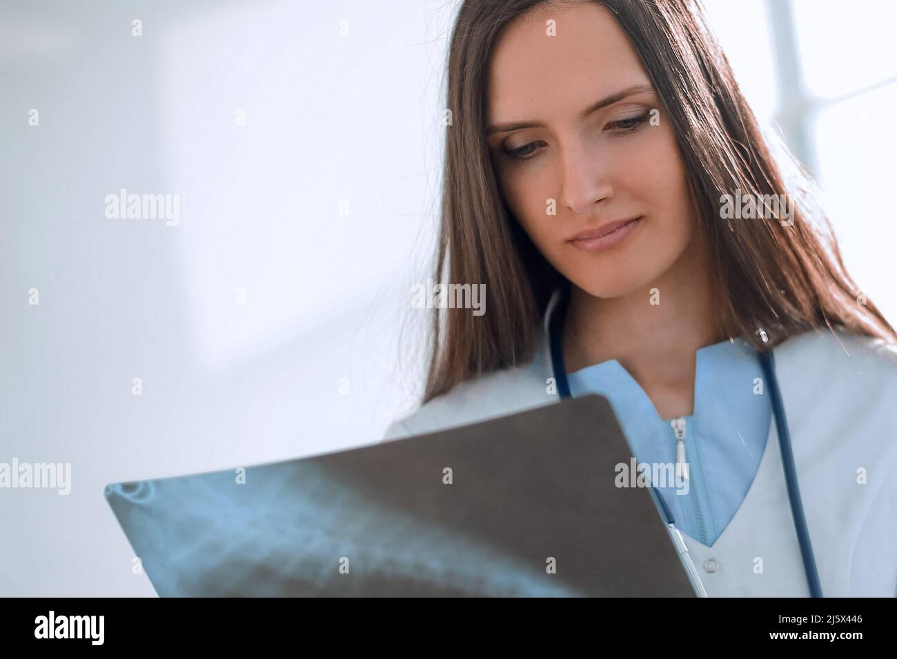 close up. woman medical doctor looking at x-ray .people and health ...