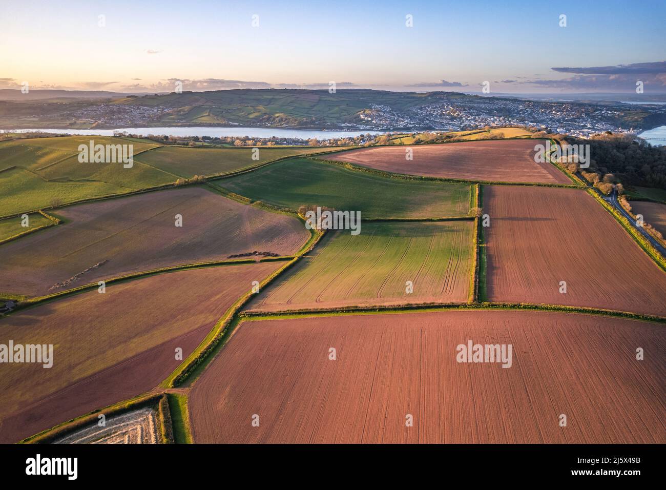 Devon Fields and Farmlands at sunset time from a drone over Shaldon and ...