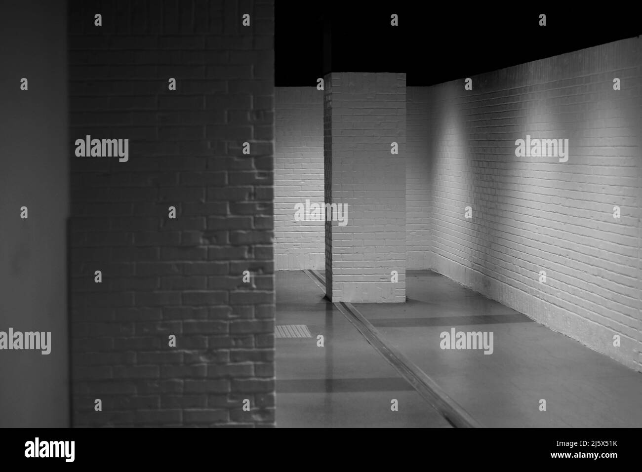 Unusual and interesting interior room with brick columns and a winding ...