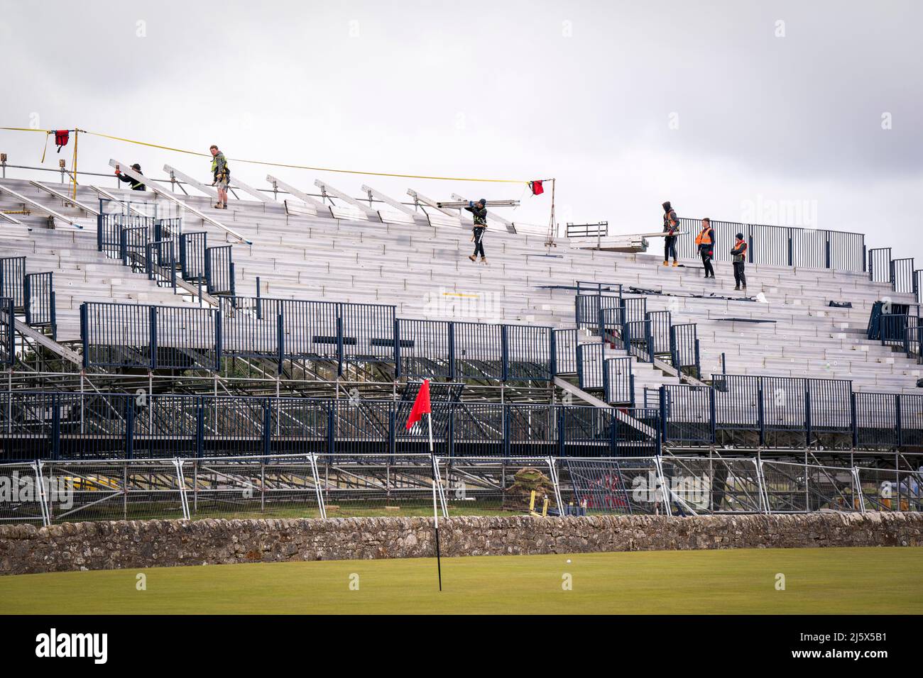 The spectator stand under construction alongside the 17th green and ...