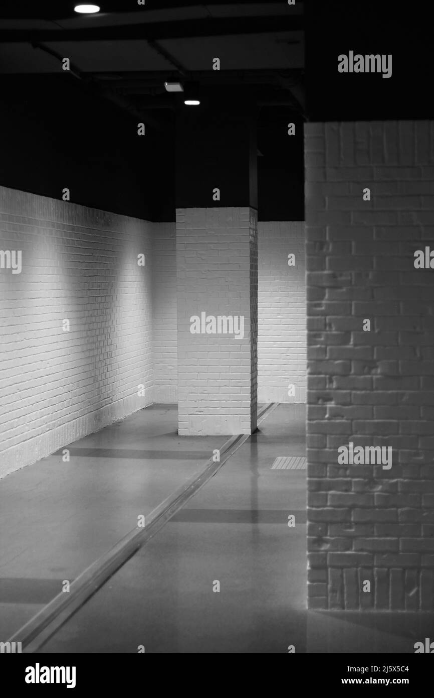 Unusual and interesting interior room with brick columns and a winding ...