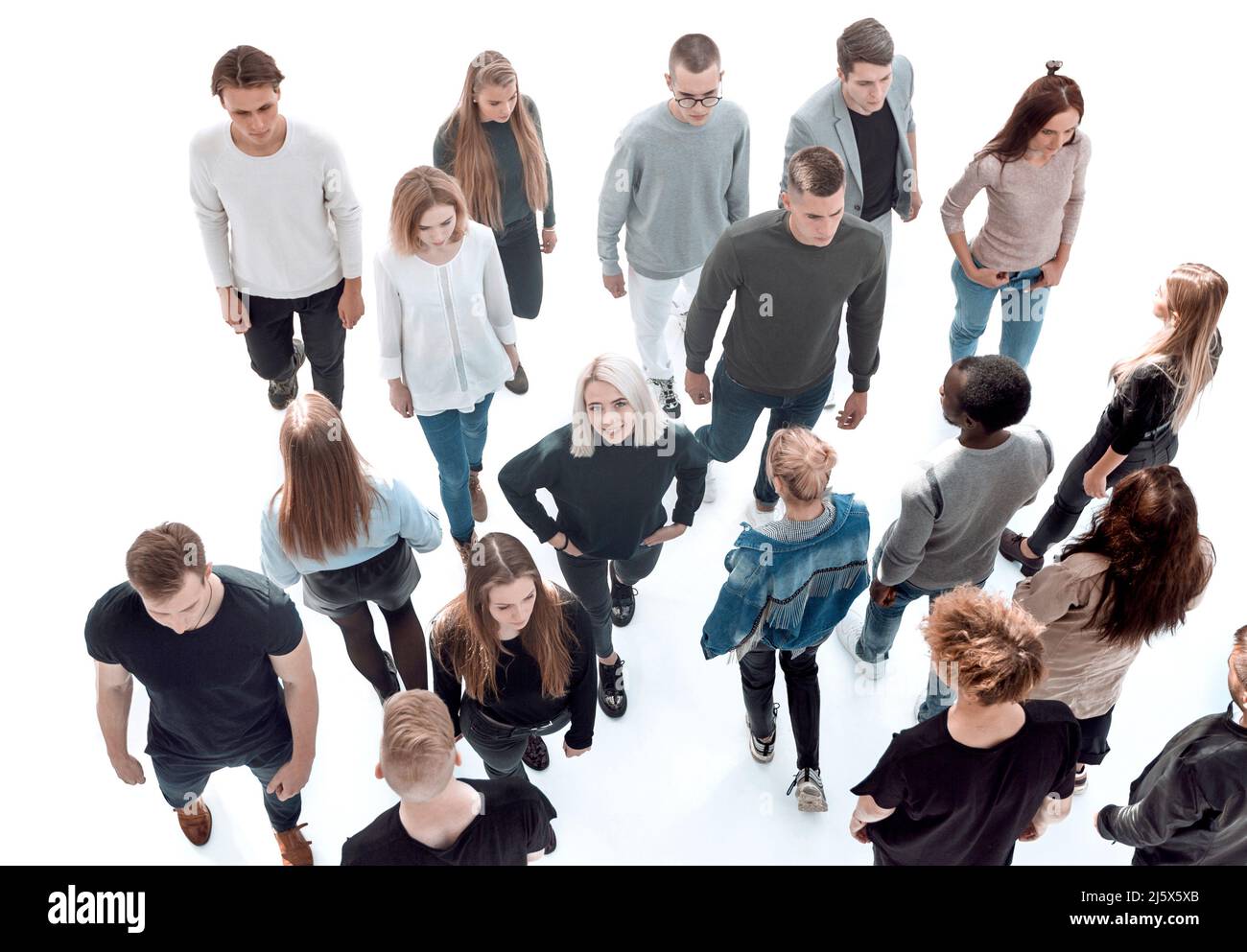 top view . young people moving in opposite directions Stock Photo - Alamy