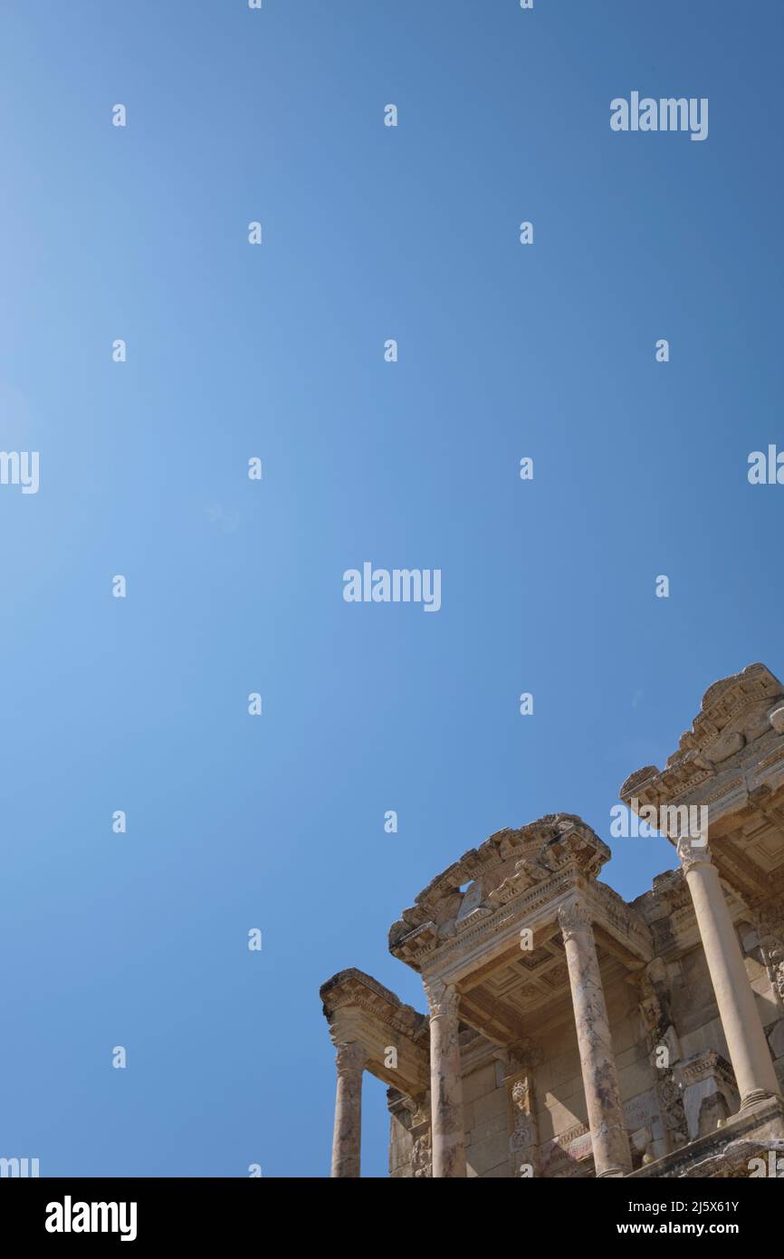 Blue sky and empty space dominates the columned facade of the Library ...