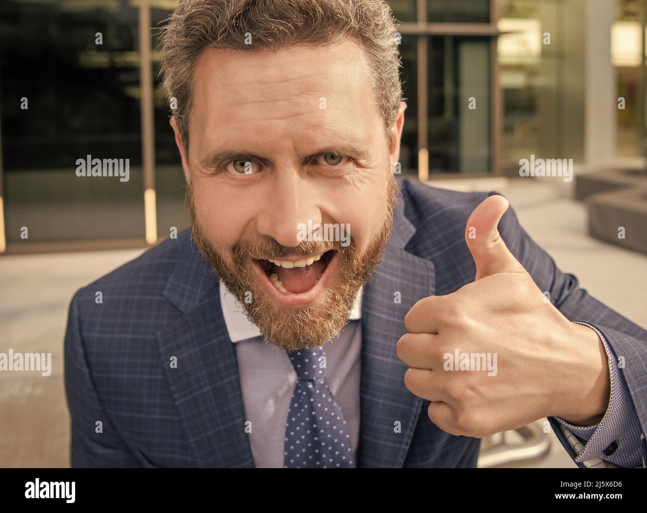 business success. successful man in businesslike suit. manager ...