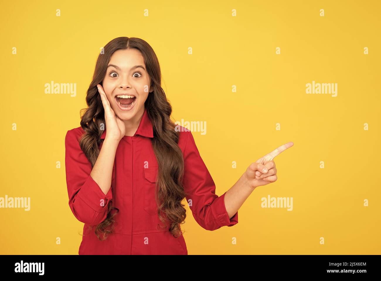 surprised kid presenting product. expressing human emotions. feel the ...