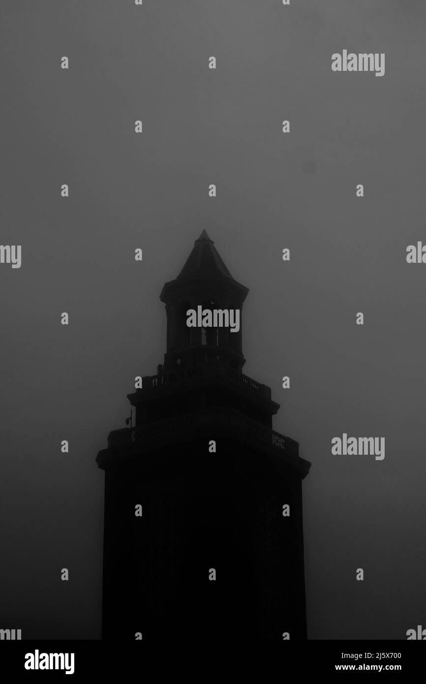 A medieval tower braving the intense fog Stock Photo - Alamy