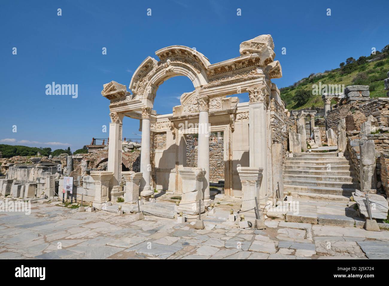 A classic Syrian Arch, part of the balanced facade of Hadrian's temple ...