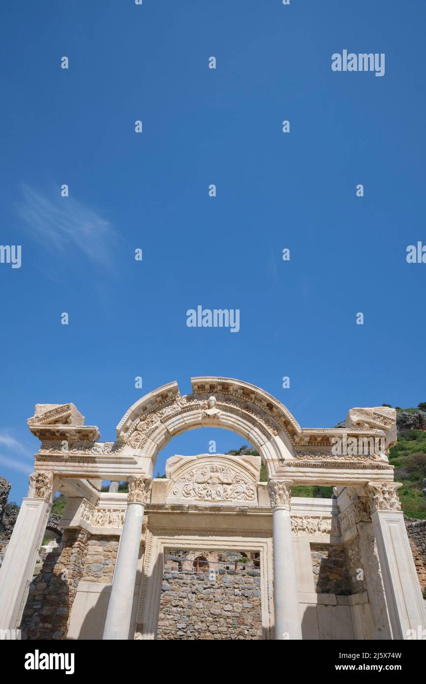 A classic Syrian Arch, part of the balanced facade of Hadrian's temple ...
