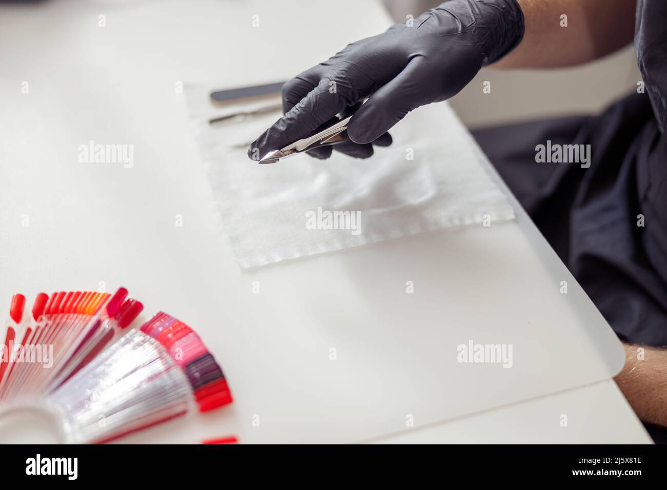 Professional nail master doing perfect manicure in salon Stock Photo ...