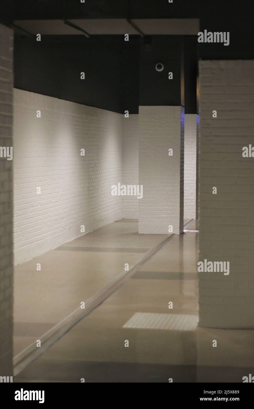 Unusual and interesting interior room with brick columns and a winding ...