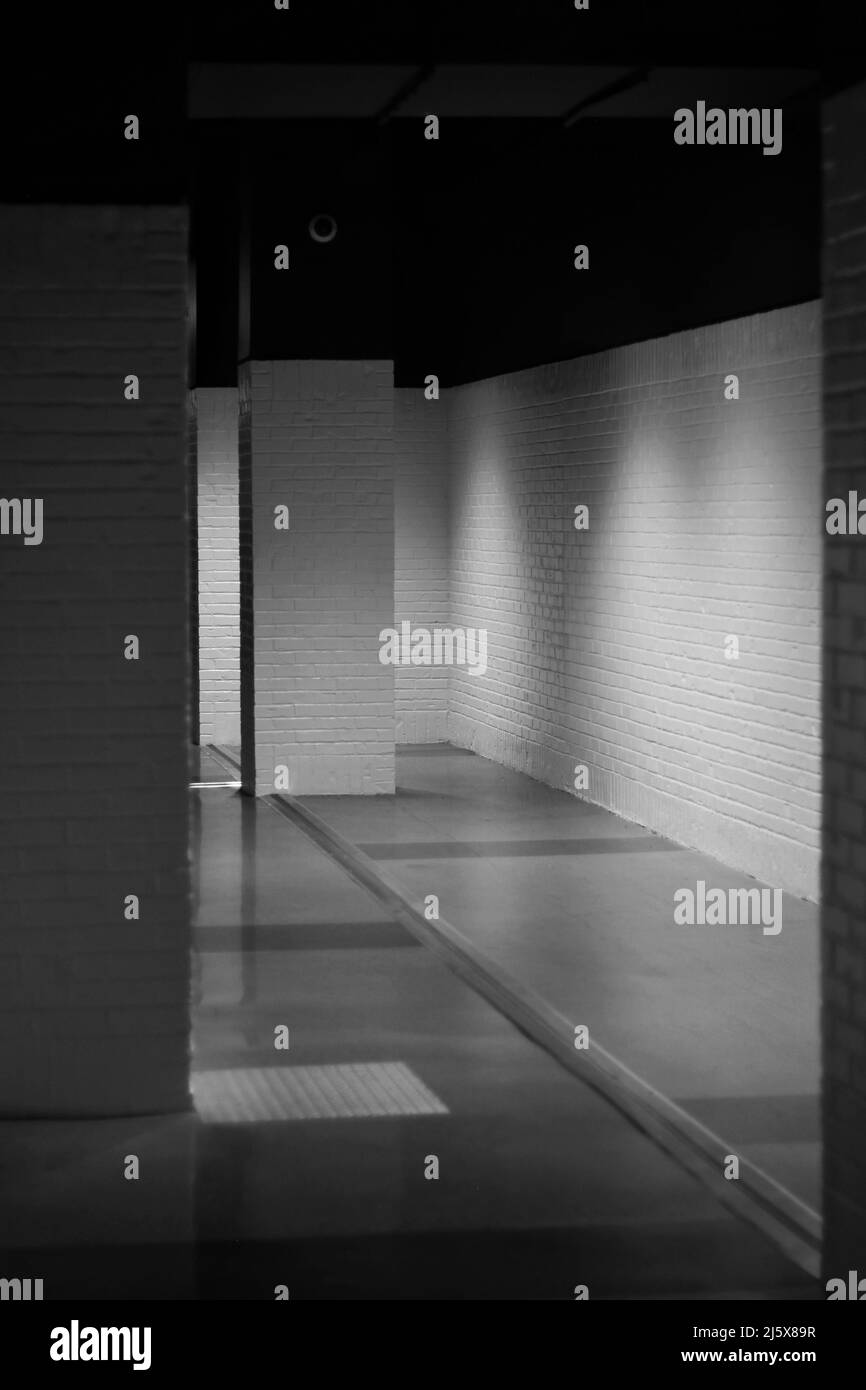 Unusual and interesting interior room with brick columns and a winding ...