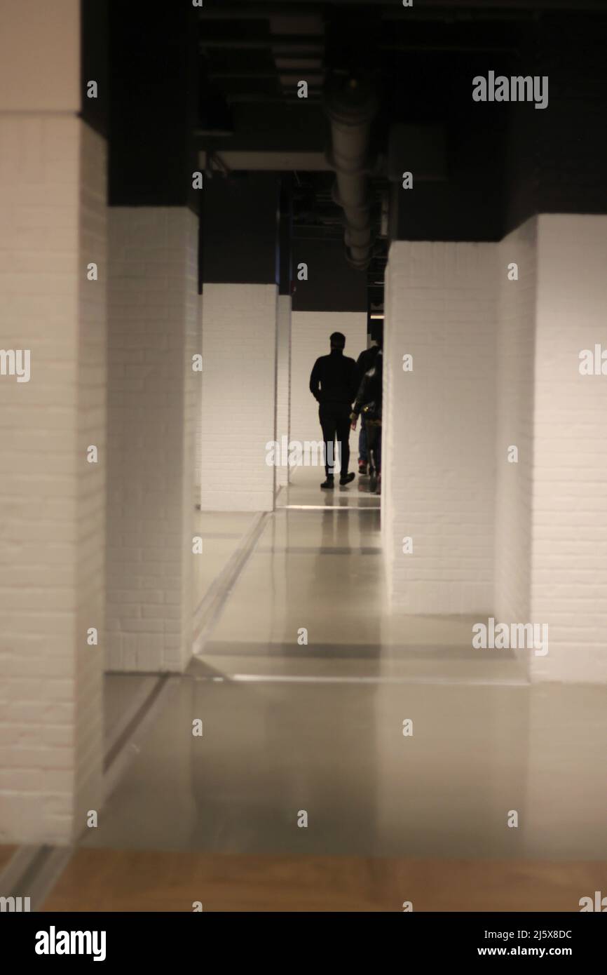 Unusual and interesting interior room with brick columns and a winding ...