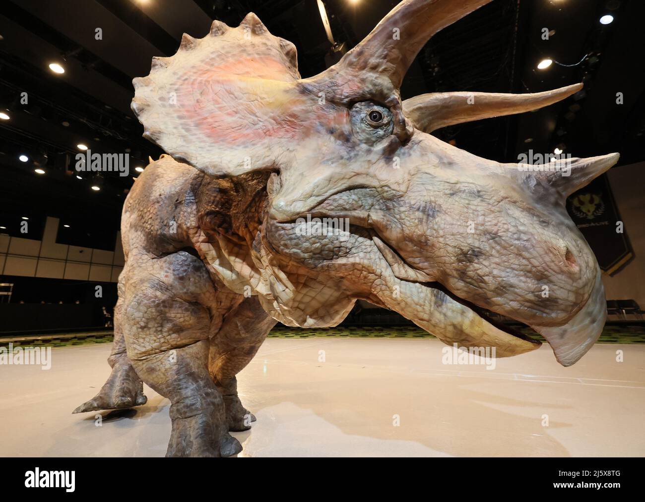 Tokyo, Japan. 26th Apr, 2022. An actor wearing dinosaur shaped ...