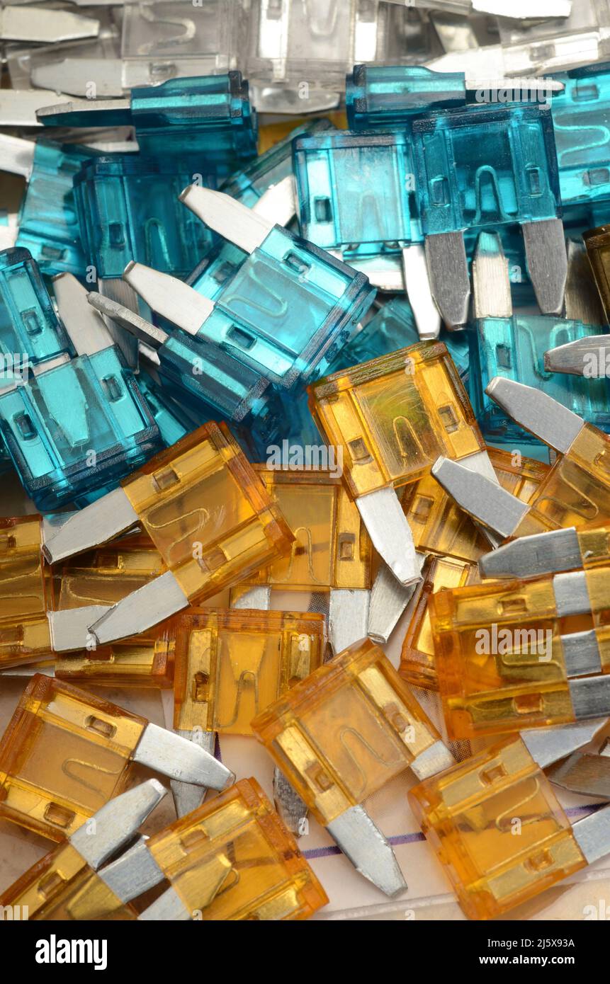 FIRECRACKERS: Color assorted spark plugs for an automobile fuel pump ...