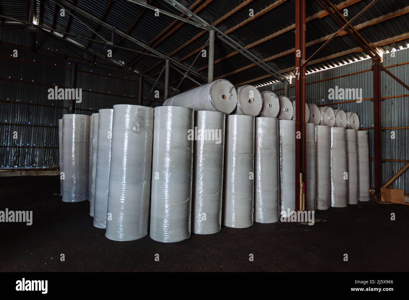 Rolls of paper in the warehouse Stock Photo - Alamy