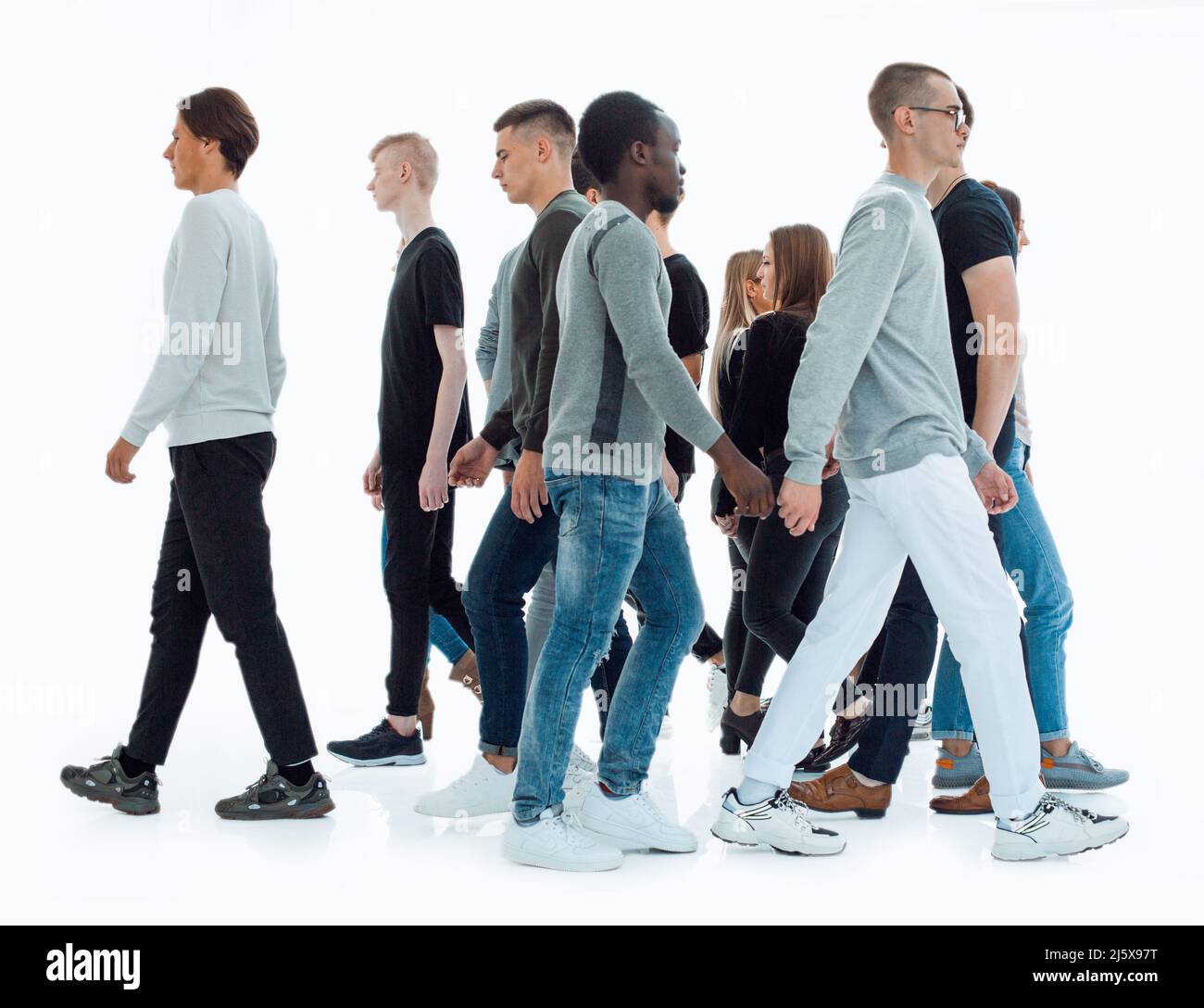 Diverse group walking Cut Out Stock Images & Pictures - Alamy