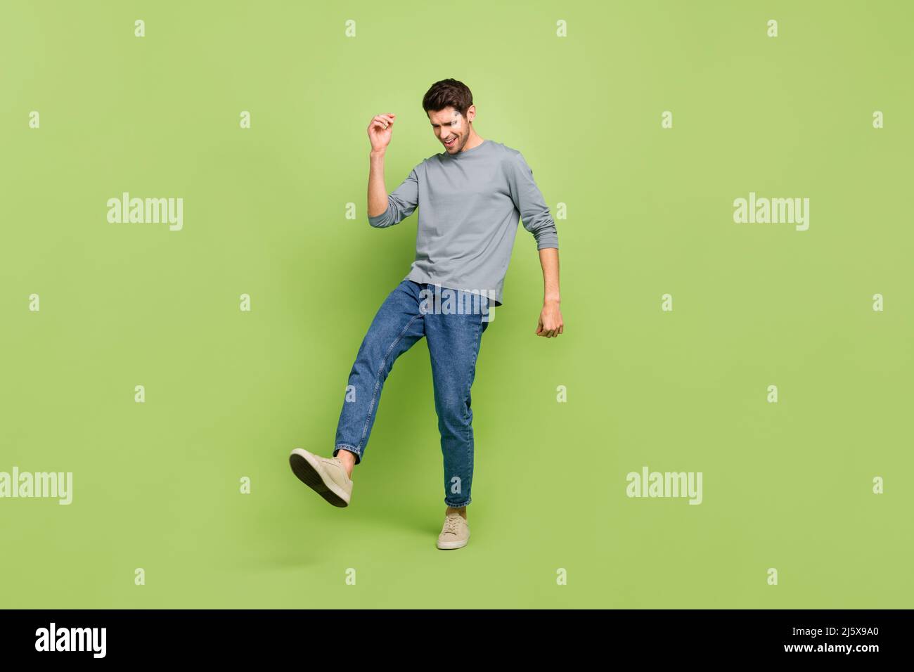 Full body photo of handsome young man have fun enjoy his hobby dancing ...