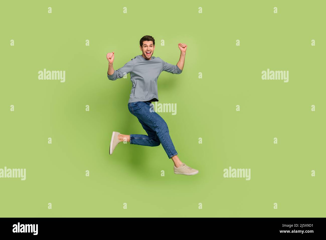 Full body profile side photo of cheerful man raise fists in success ...