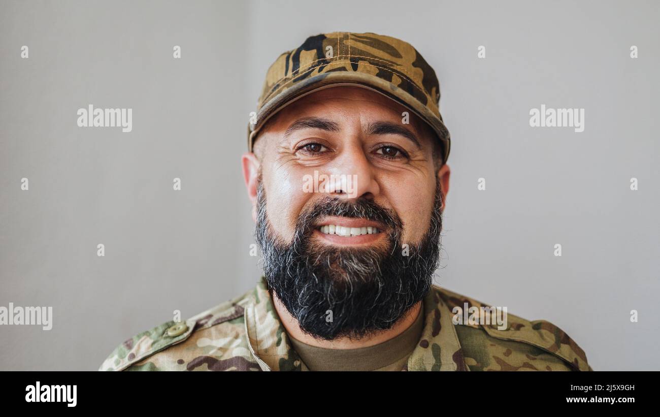 Veteran soldier man smiling at camera during army military service ...