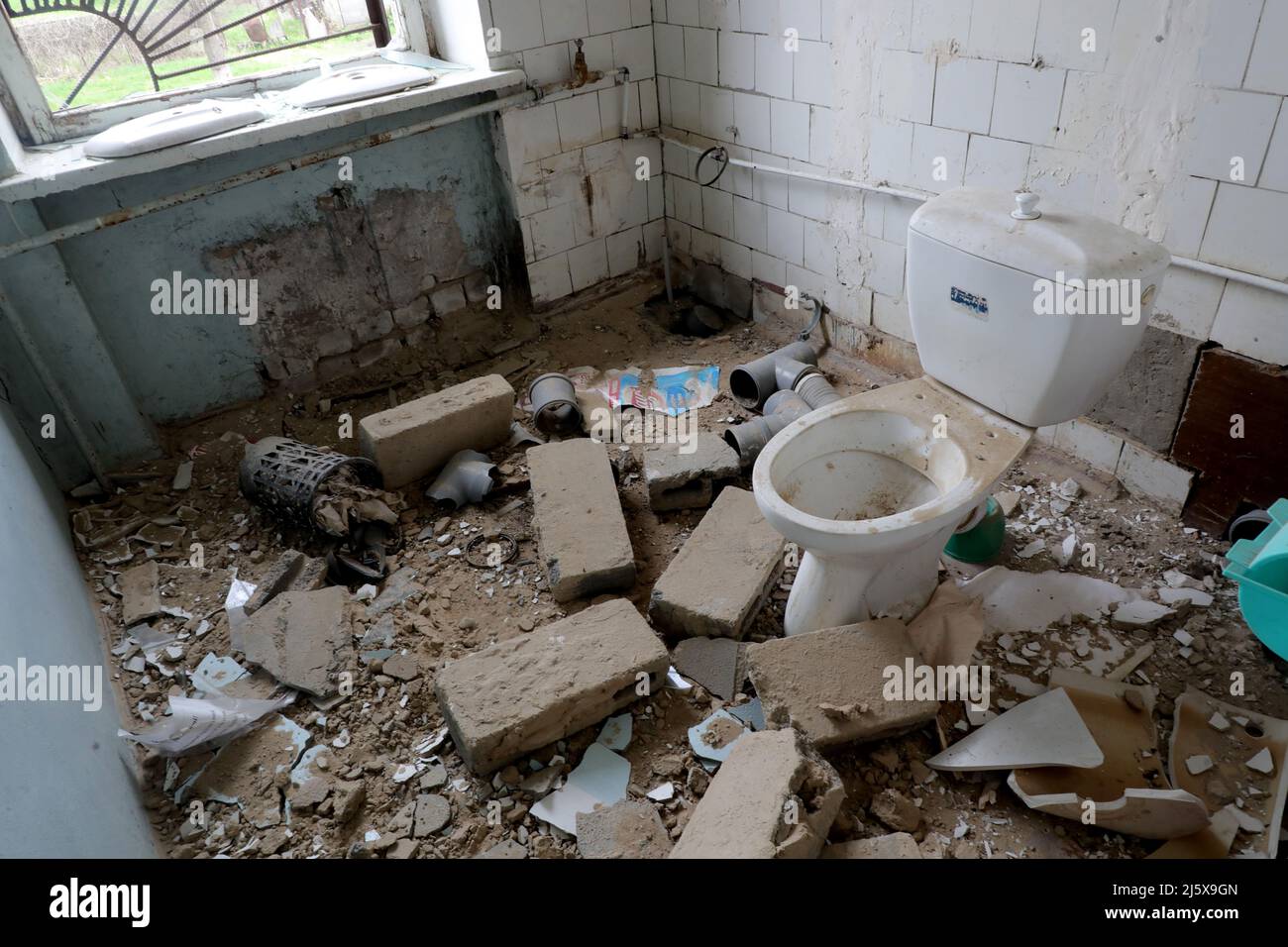 BORODIANKA, UKRAINE - APRIL 26, 2022 - Rubble covers the ground in a ...