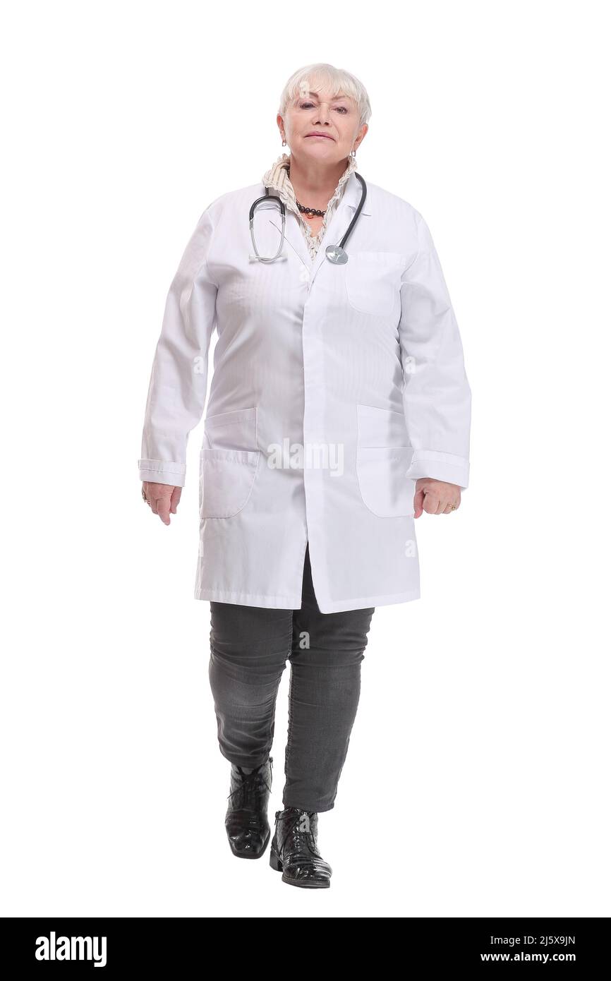 Front view of female doctor walking towards the camera smiling Stock ...