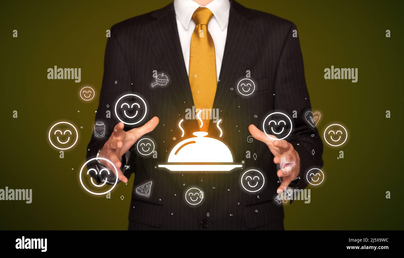 Hand holding food related icons Stock Photo - Alamy