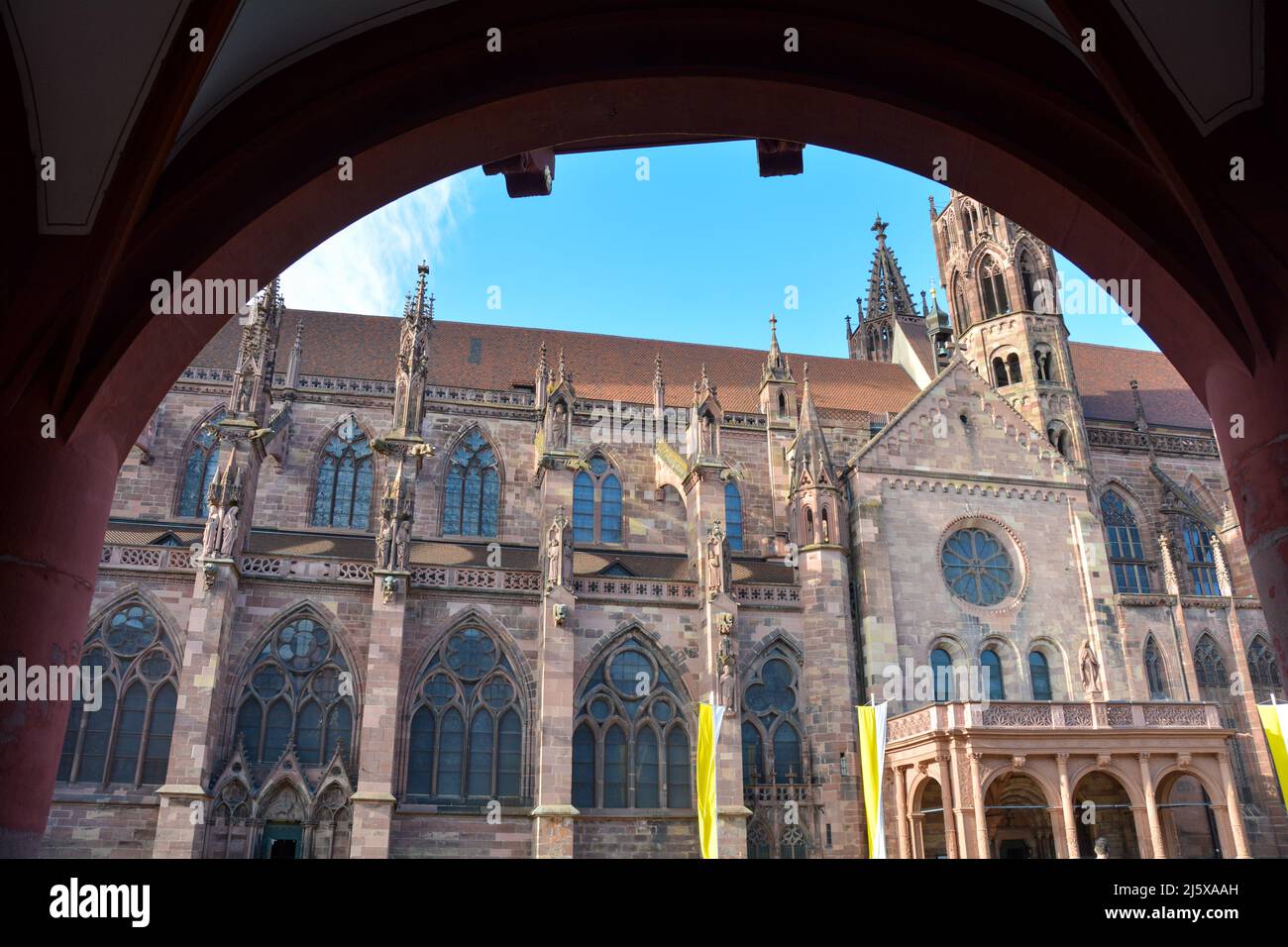 View through the stone arch of the Historical Merchants Hall to the ...