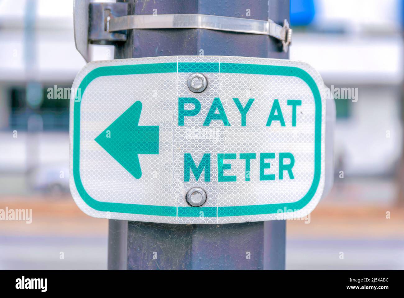 Pay at meter sign on a post at Silicon Valley, San Jose, California ...