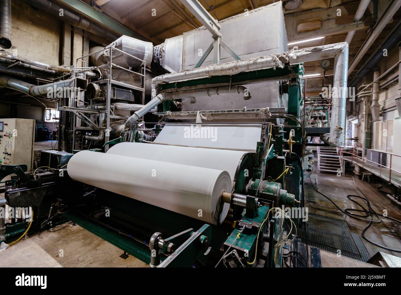 Waste paper recycling plant. Machine for production of paper rolls ...