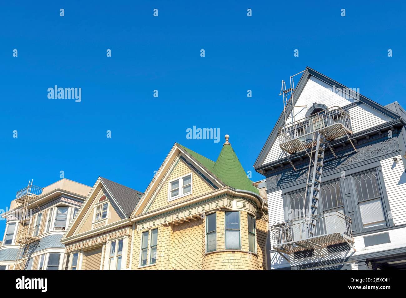Houses with gable roofs in a low angle view in San Francisco ...
