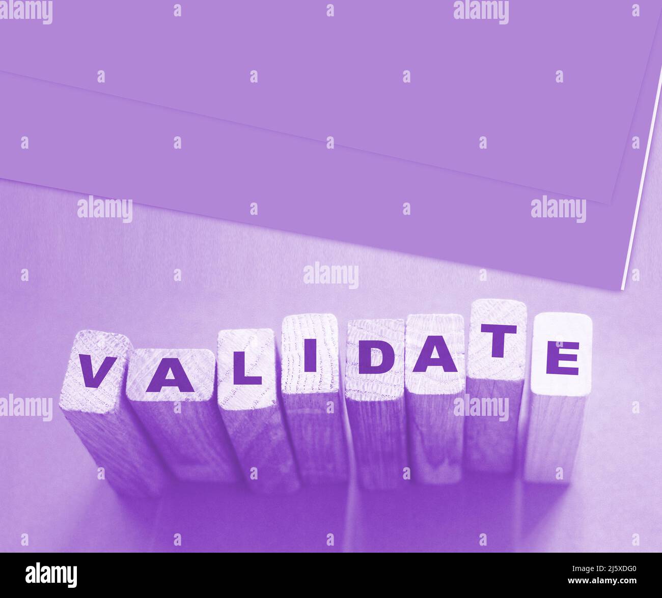 Validate word on Wooden Blocks. Business evaluation concept Stock Photo ...