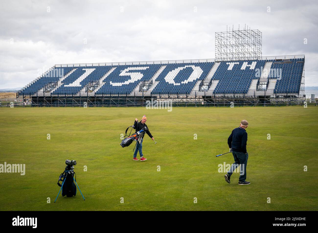 The spectators grandstand alongside the 1st and 18th holes during The ...
