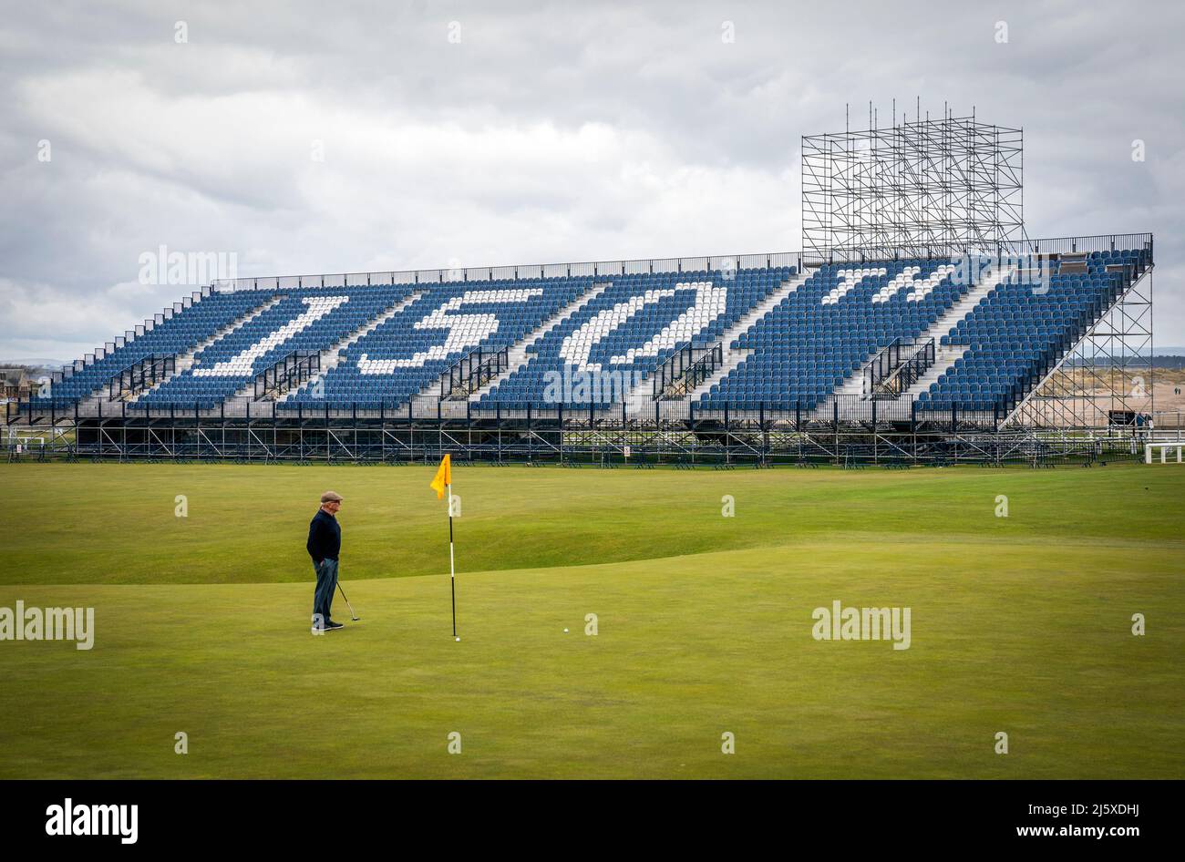 The spectators grandstand alongside the 1st and 18th holes during The ...