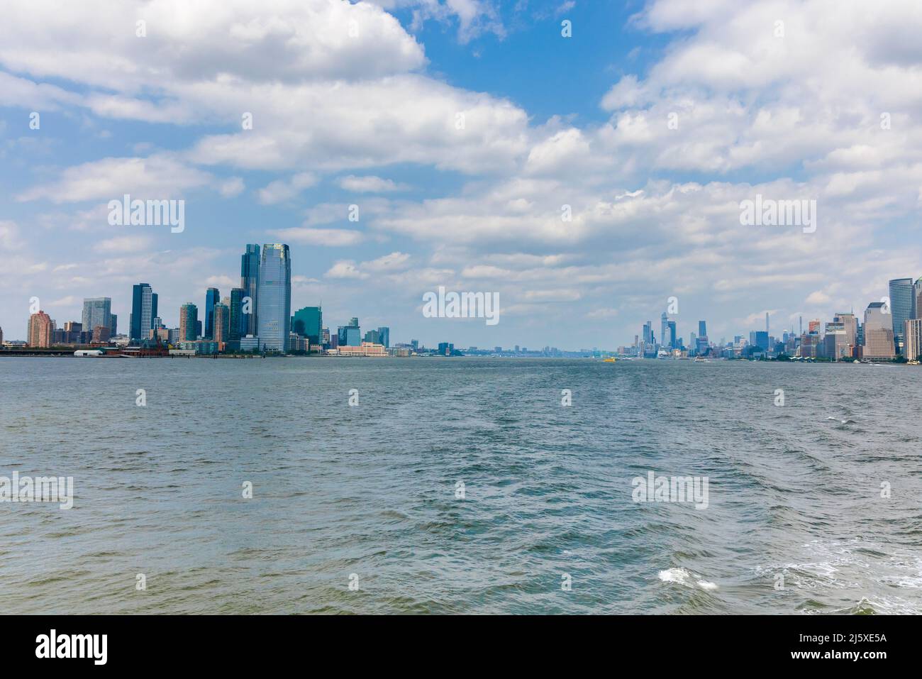 Lower Manhattan as seen from runing boat. New York City Stock Photo - Alamy