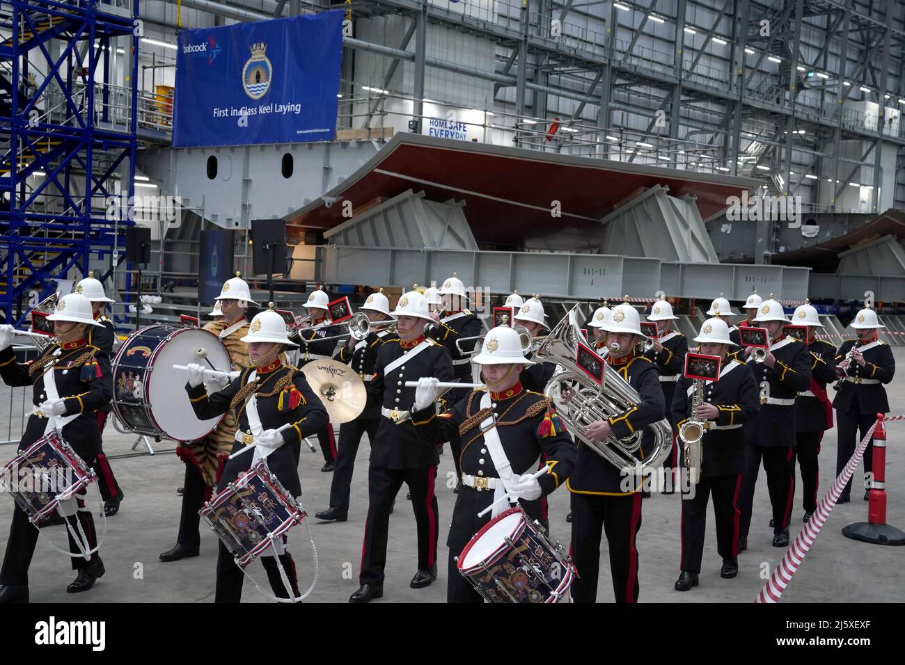 The Royal Marine Pipe Band plays during the Keel Laying Ceremony for ...