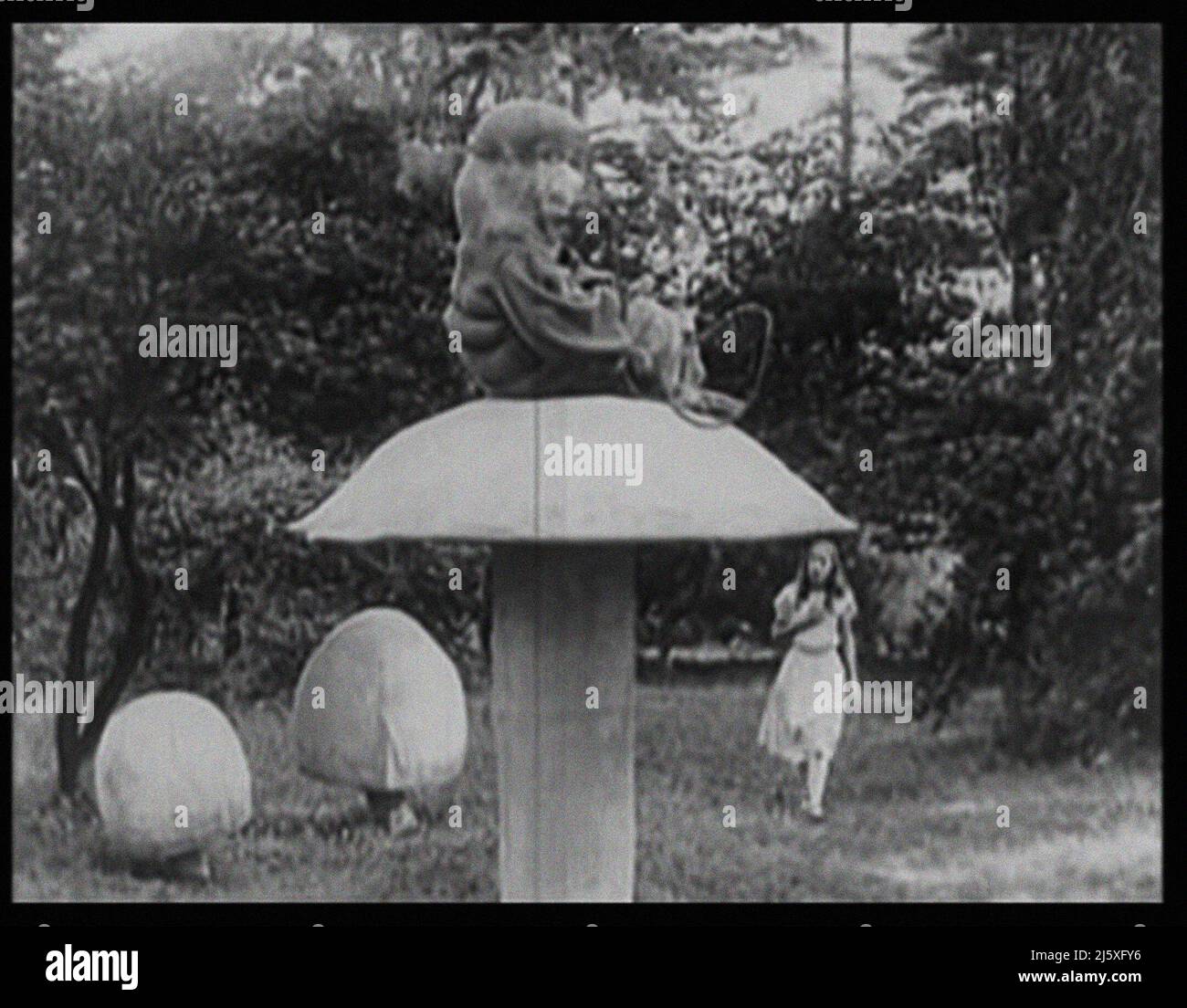 “alice in wonderland” 1915 hi-res stock photography and images - Alamy