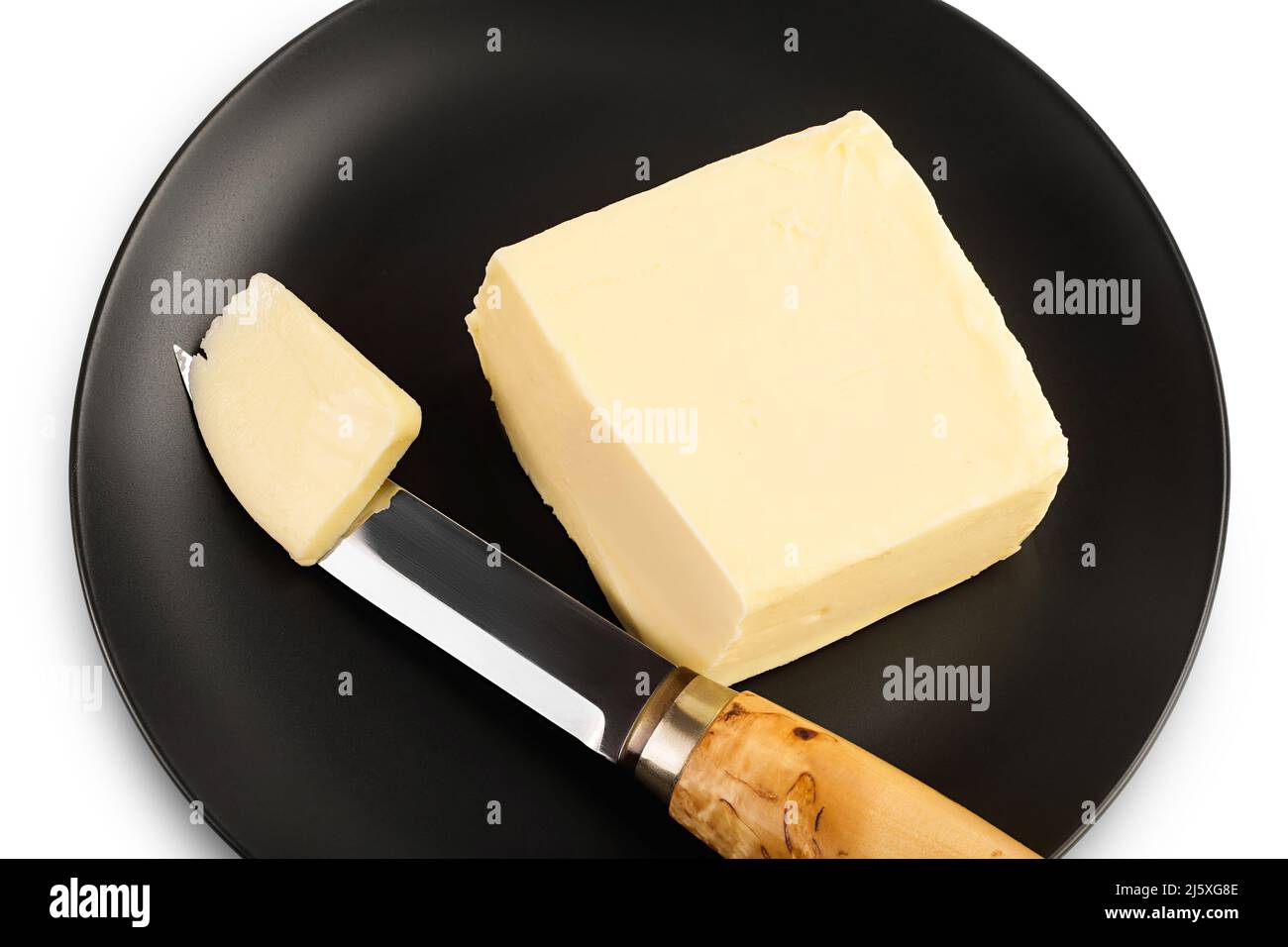 butter slices in black plate isolated on white background with clipping ...