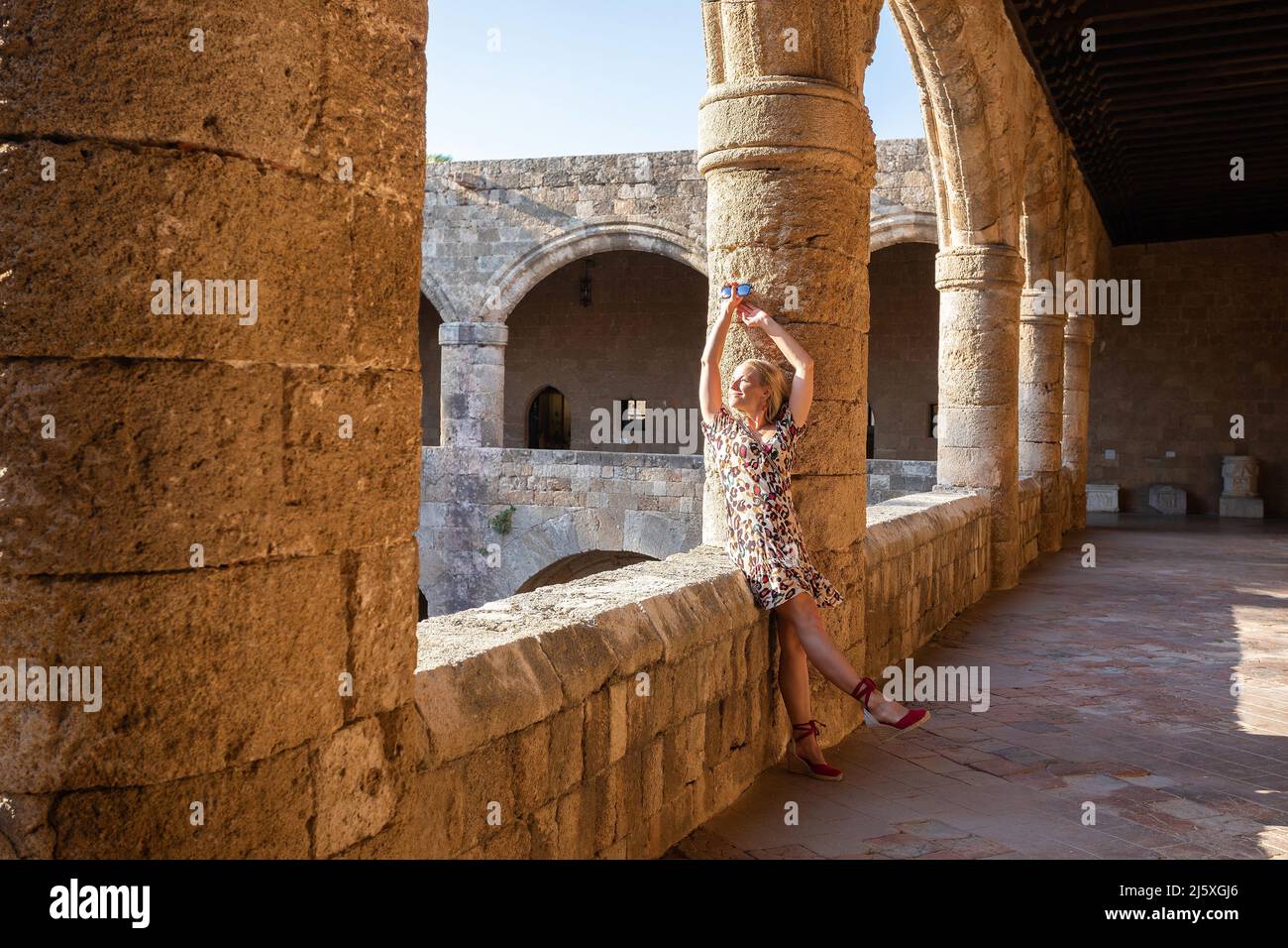 Woman visits the Museum of Archeology on the island of Rhodes, Greece ...