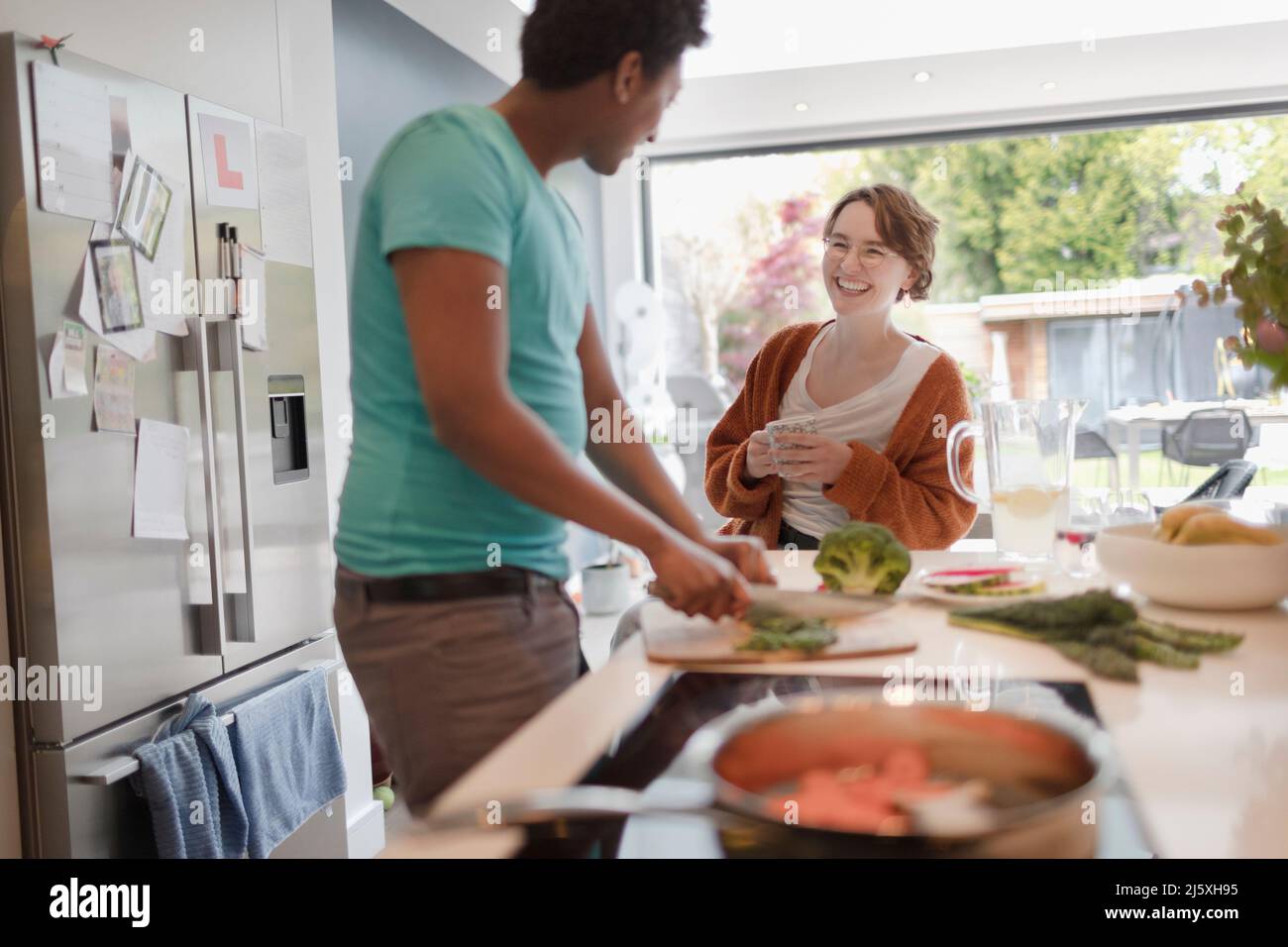 Happy couple talking preparing hi-res stock photography and images - Alamy