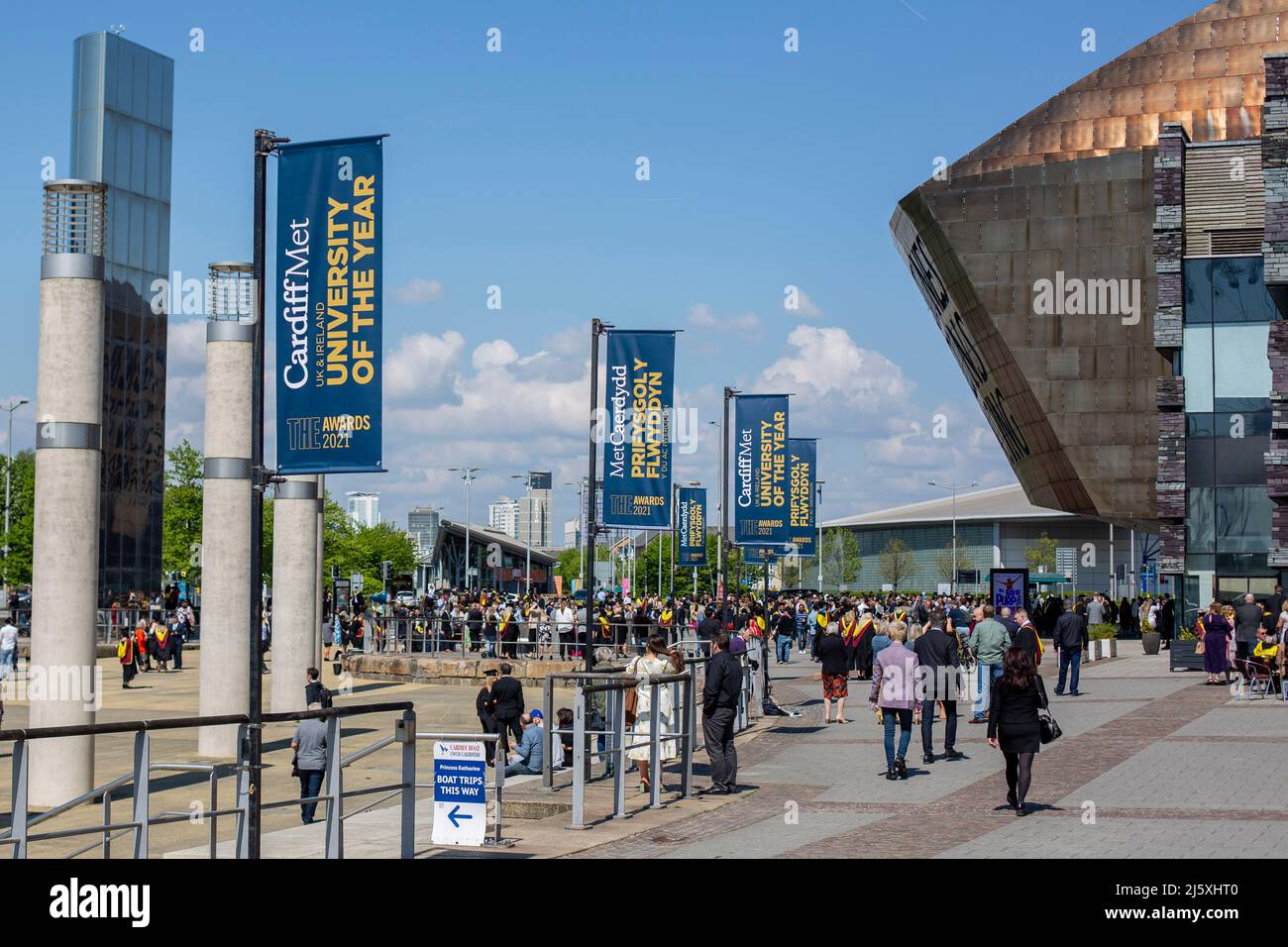 Cardiff Met University banners and graduands outside the Wales ...