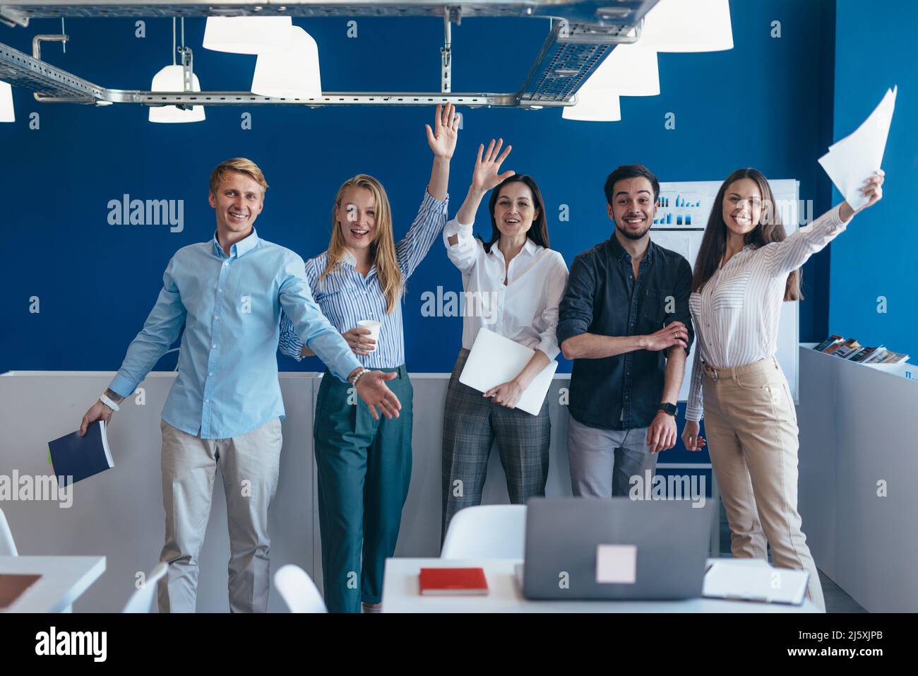 Young friendly people waving their hands and ready to hug Stock Photo ...